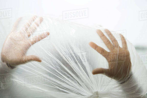 Hands inside plastic bag, cropped view - Royalty-free Stock Photo ...