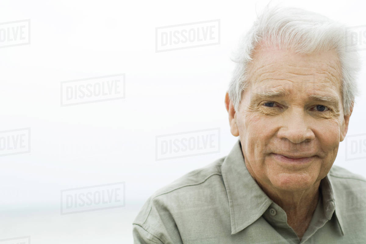 Senior man smiling at camera, portrait - Royalty-free Stock Photo ...
