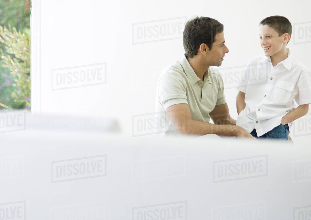 Man and son talking - Stock Photo - Dissolve