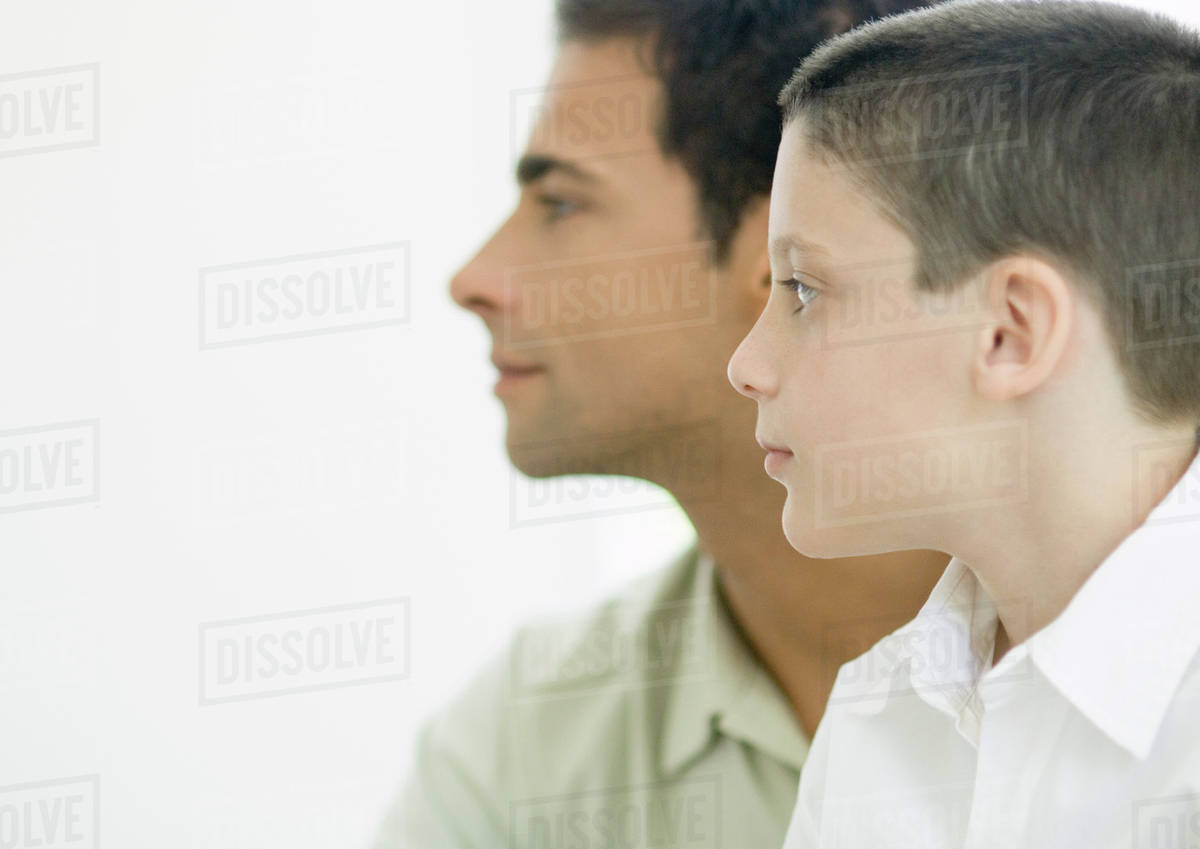 Father and son, profile - Stock Photo - Dissolve