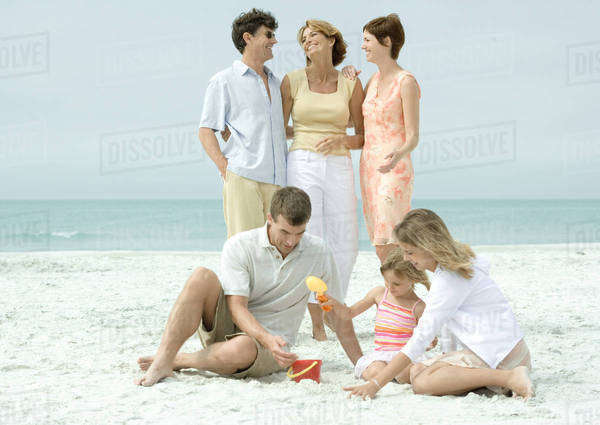 Group on beach - Stock Photo - Dissolve