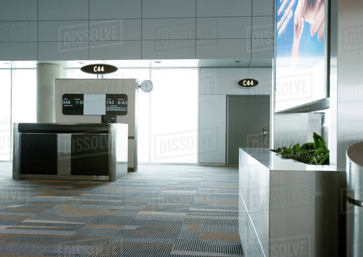 Check-in counter at boarding gate - Stock Photo - Dissolve