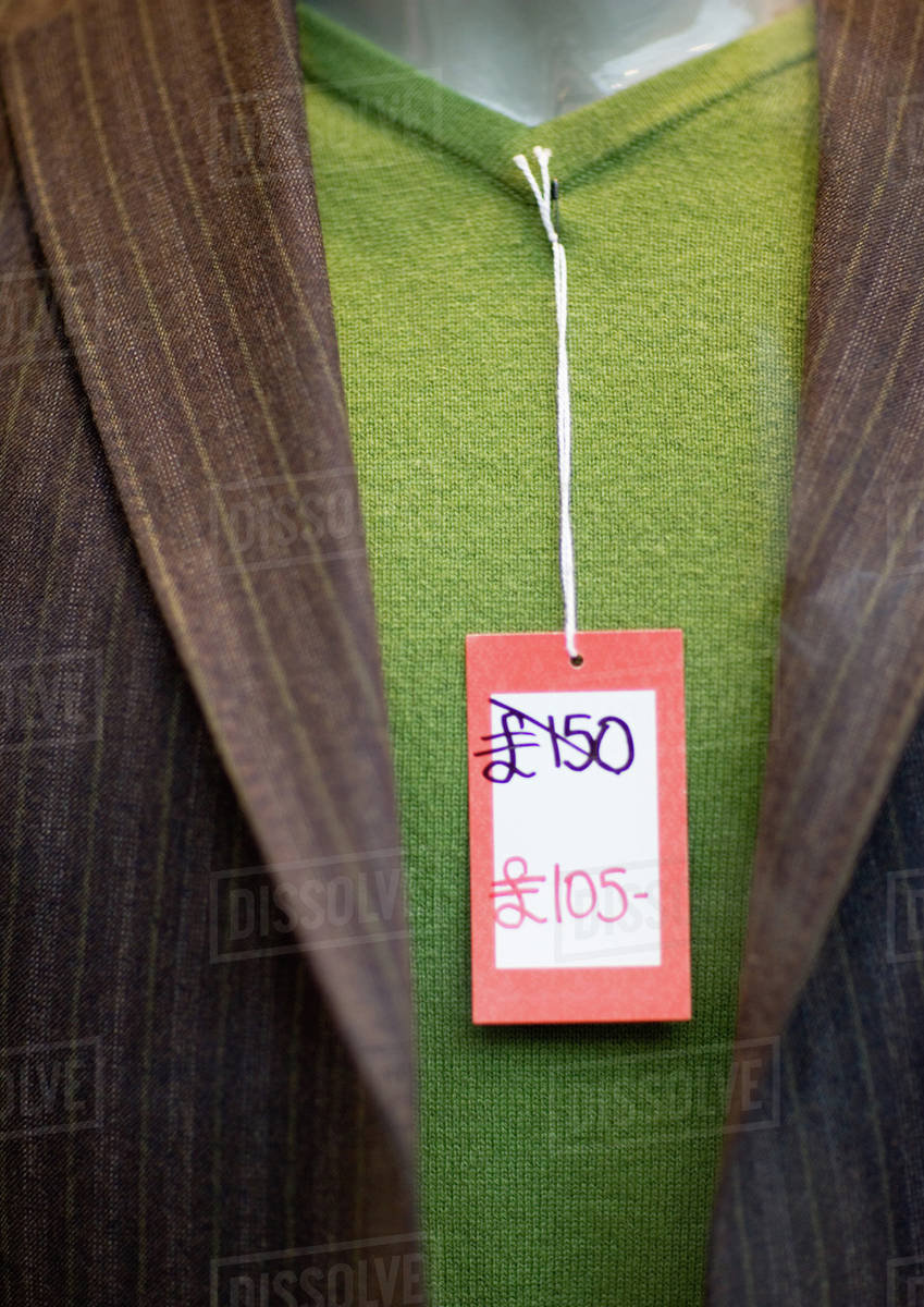 Sweater with reduced price on tag - Stock Photo - Dissolve