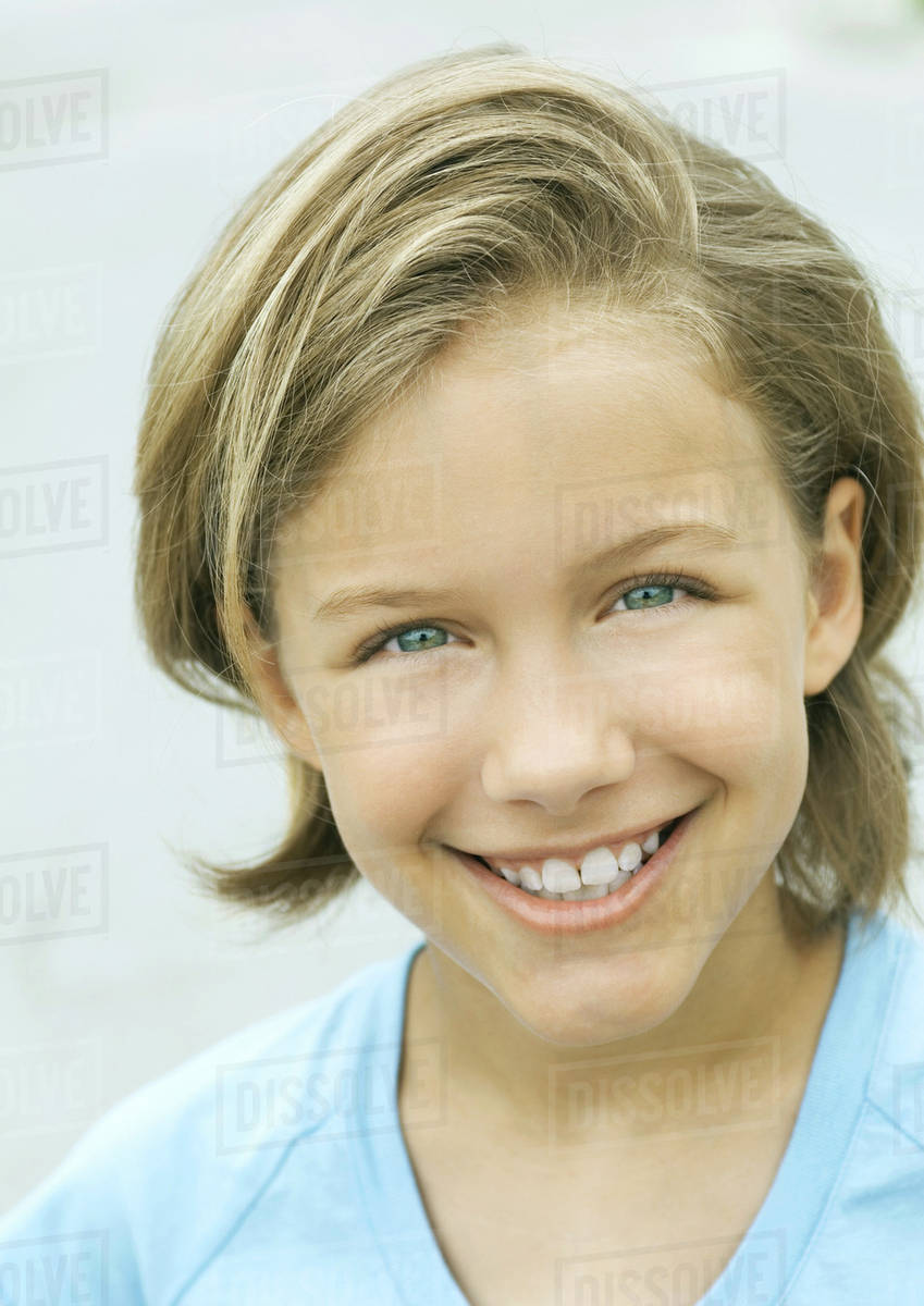 Girl smiling, portrait - Royalty-free Stock Photo | Dissolve