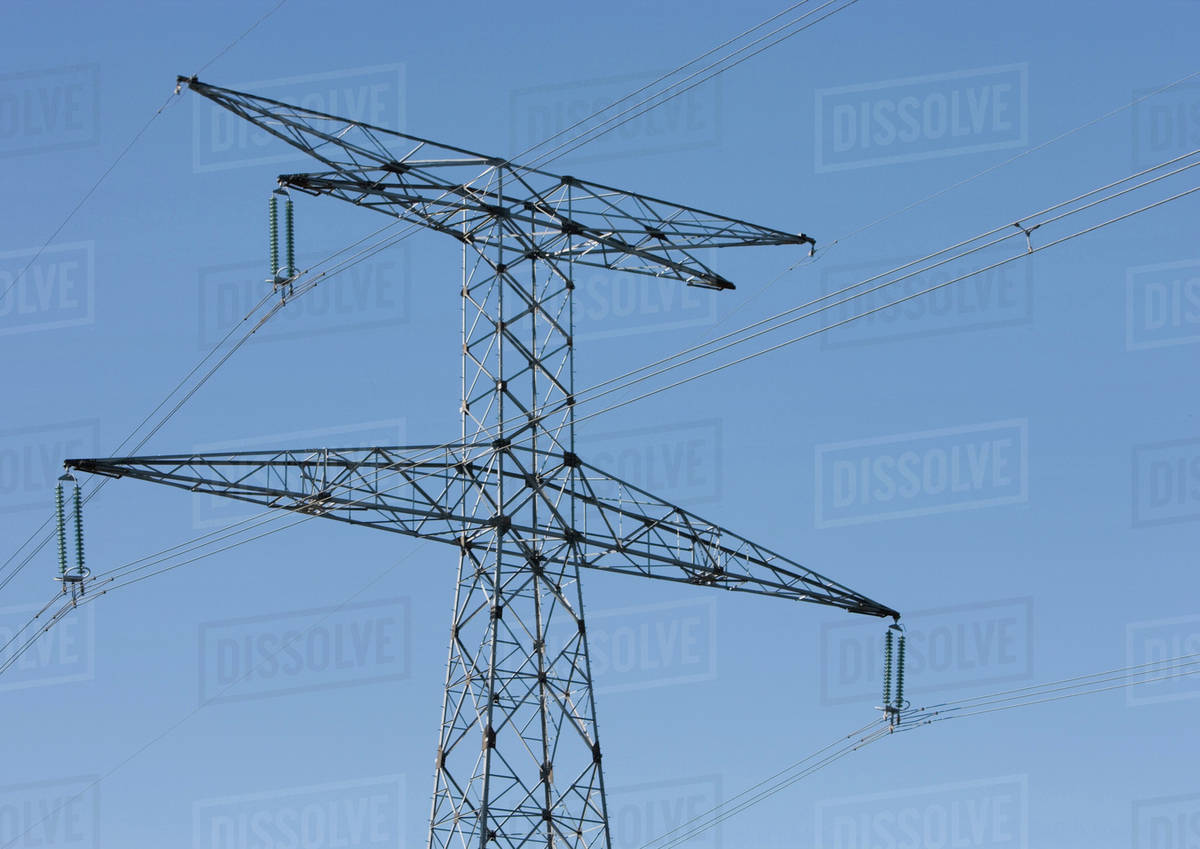 Electric pylon, low angle view - Stock Photo - Dissolve