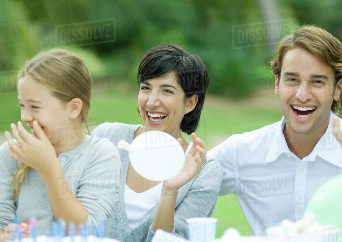 Family having outdoor birthday party - Royalty-free Stock Photo | Dissolve