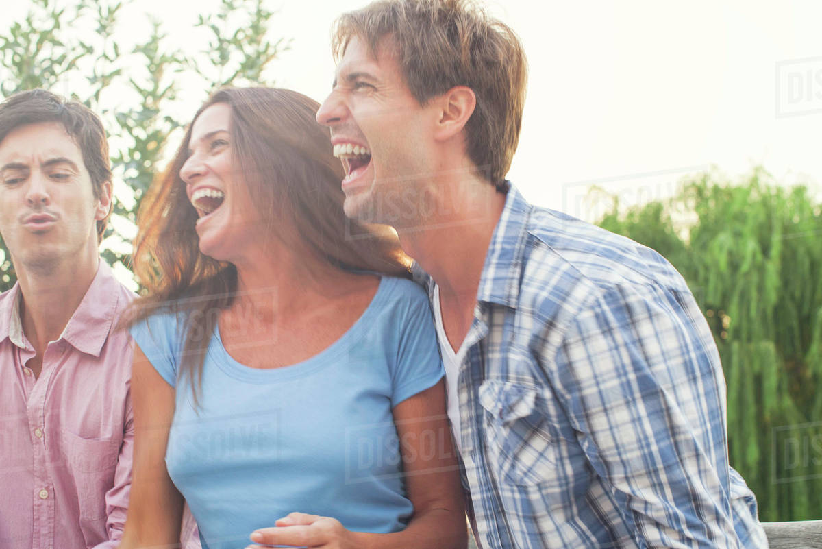 Friends hanging out, laughing and having fun together - Stock Photo ...