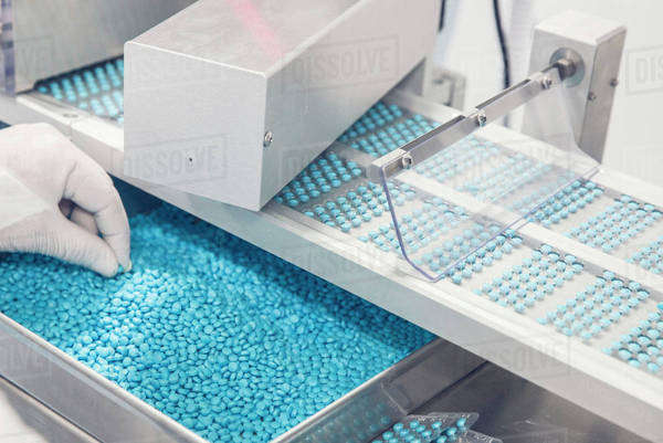 Prescription drug packaging process - Royalty-free Stock Photo | Dissolve