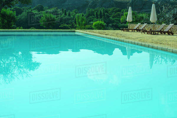 Tranquil swimming pool - Royalty-free Stock Photo | Dissolve