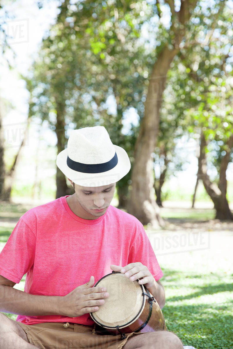 Man playing conga - Stock Photo - Dissolve