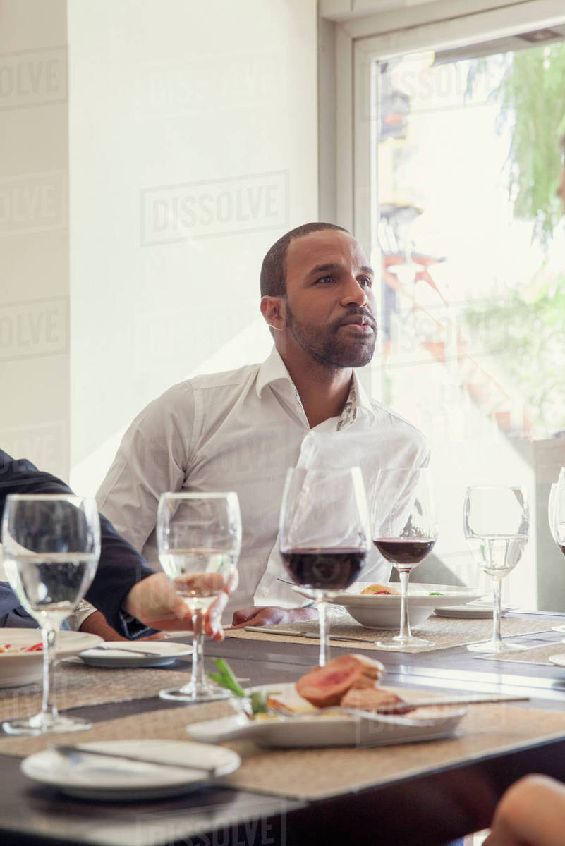 Man dining in restaurant - Royalty-free Stock Photo | Dissolve