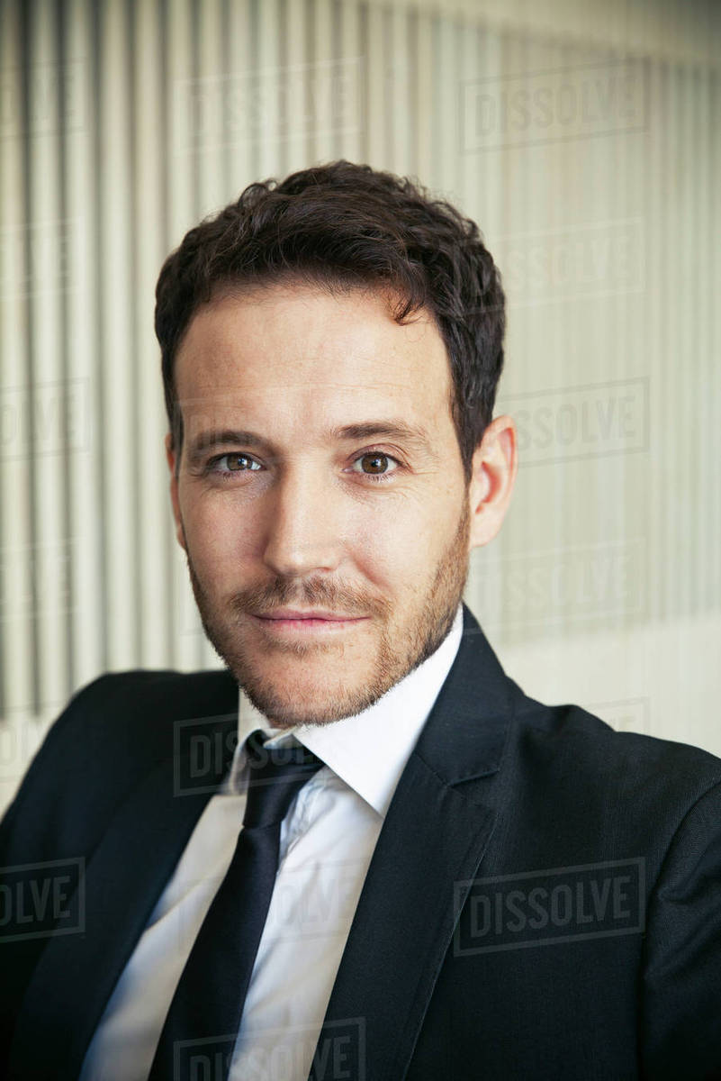 Business executive, portrait - Stock Photo - Dissolve