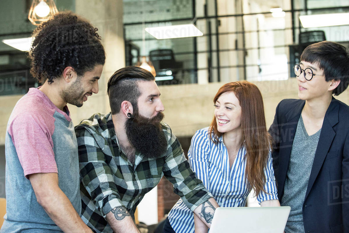 Team of collegues collaborating in office - Royalty-free Stock Photo ...
