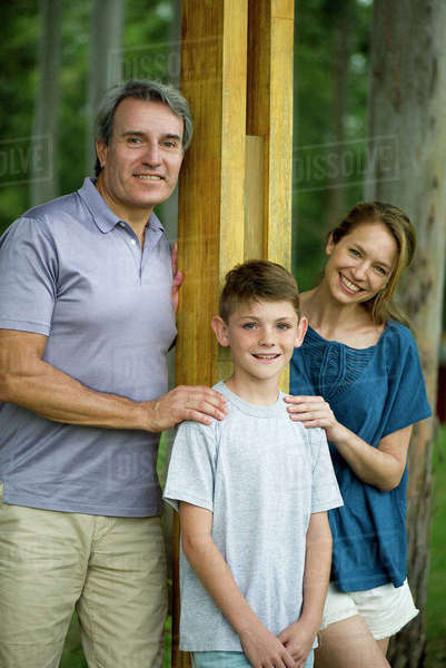 Family with one child, portrait - Stock Photo - Dissolve