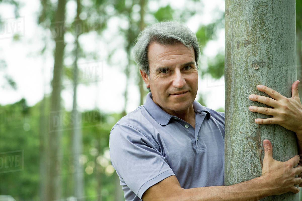 Man hugging tree - Royalty-free Stock Photo | Dissolve