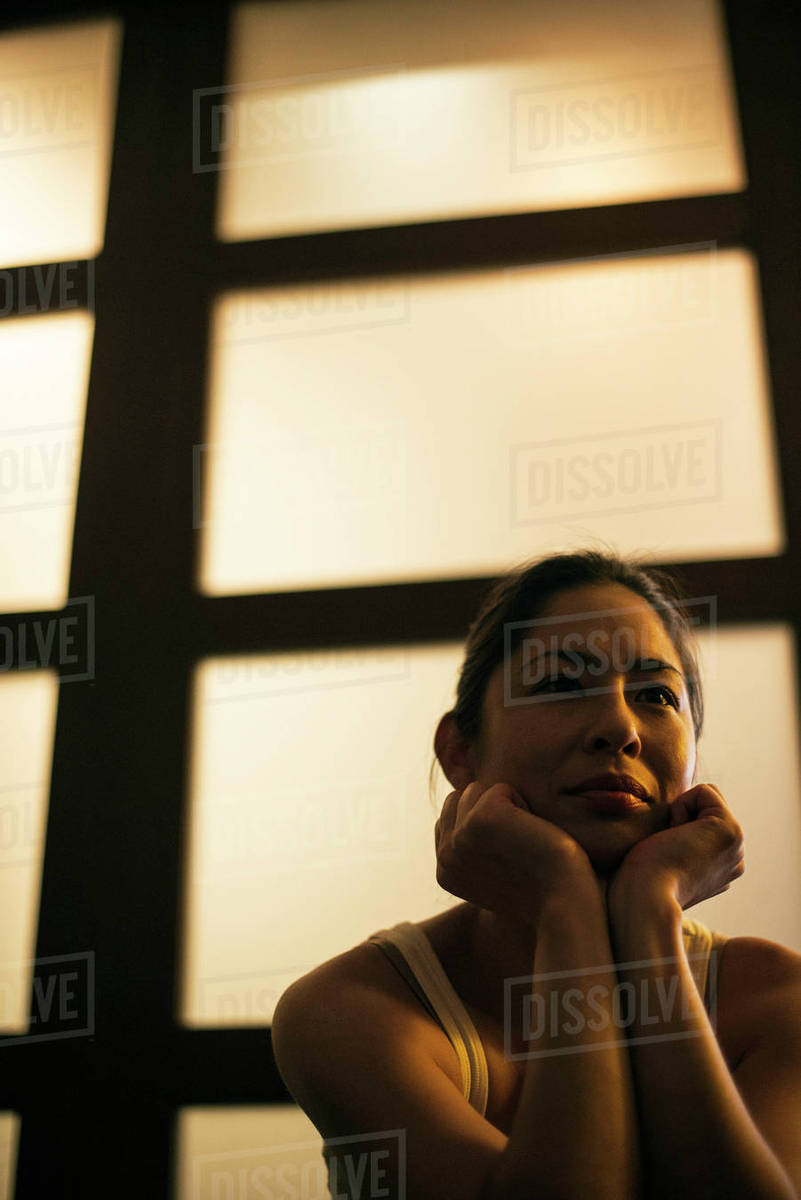 Woman leaning on elbow - Royalty-free Stock Photo | Dissolve
