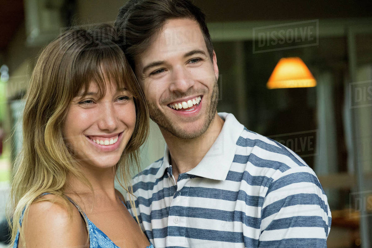 Young couple smiling together, portrait - Royalty-free Stock Photo ...
