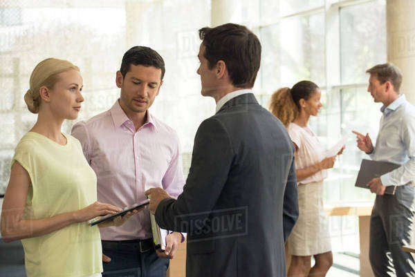 Salesman meeting with clients - Royalty-free Stock Photo | Dissolve