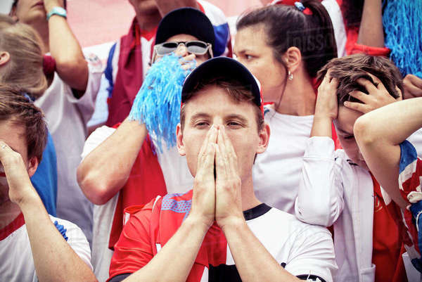 Football fans expressing disappointment at football match - Royalty ...