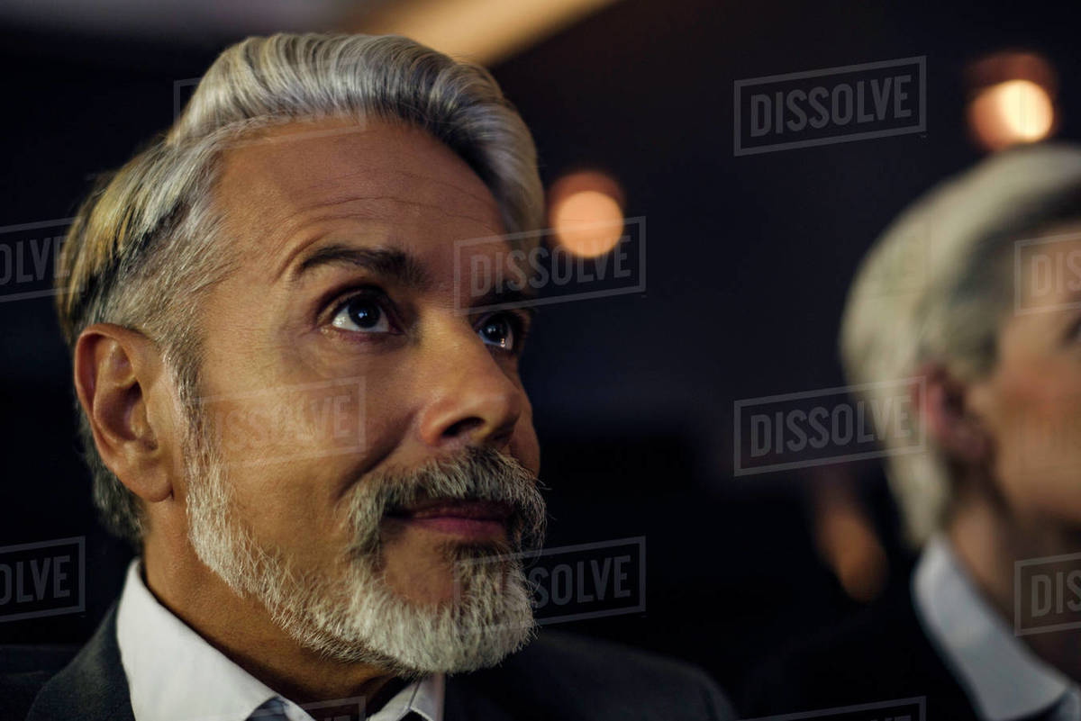 Man watching performance - Stock Photo - Dissolve