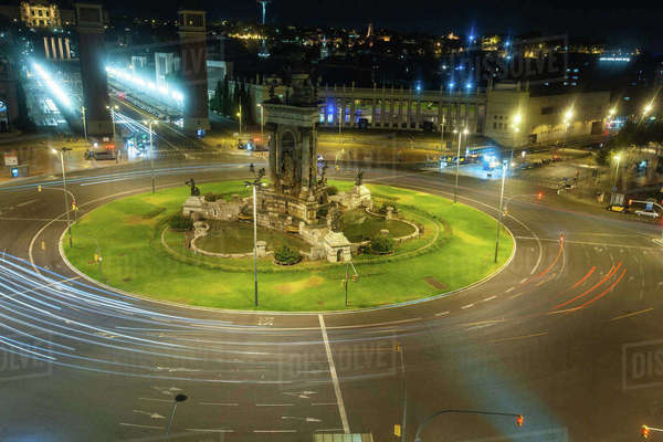 Plaza Espana roundabout light trails - Stock Photo - Dissolve