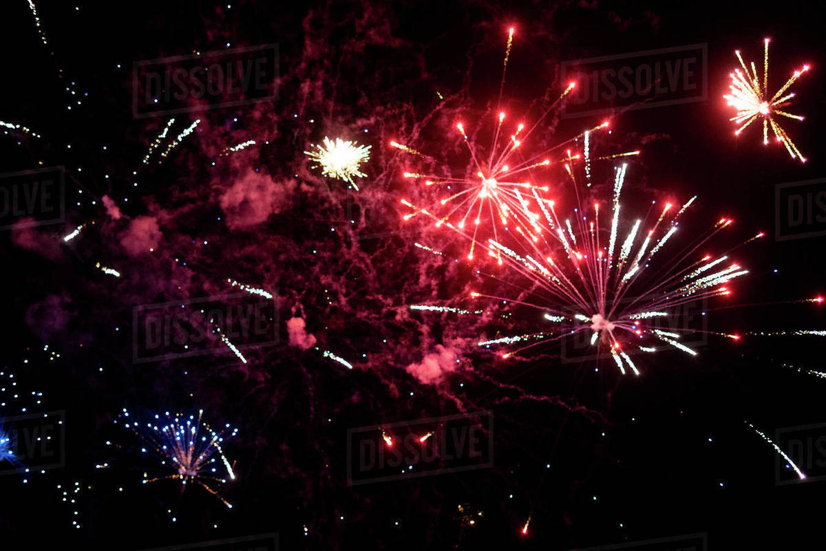 Fireworks display in sky - Royalty-free Stock Photo | Dissolve