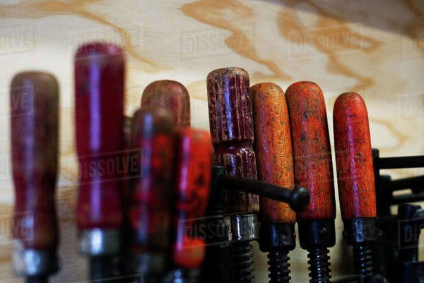 Hand tools hanging in workshop - Royalty-free Stock Photo | Dissolve