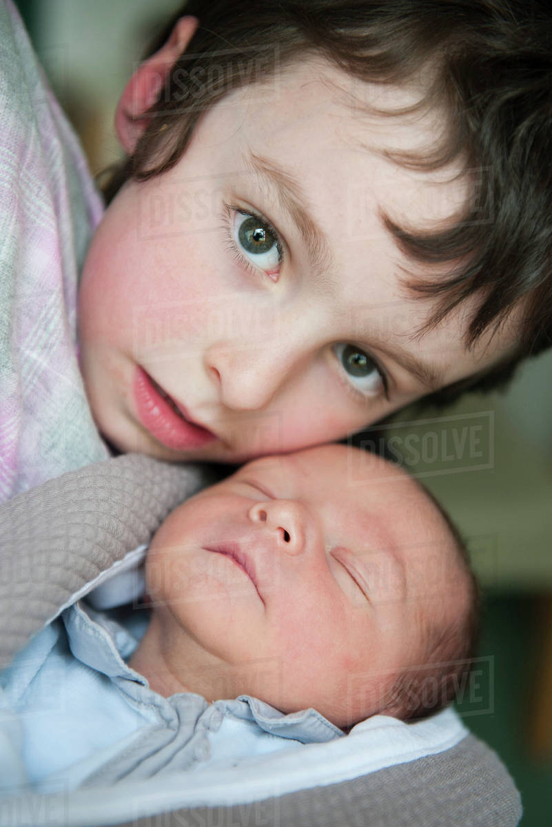 Boy and baby brother, portrait - Stock Photo - Dissolve