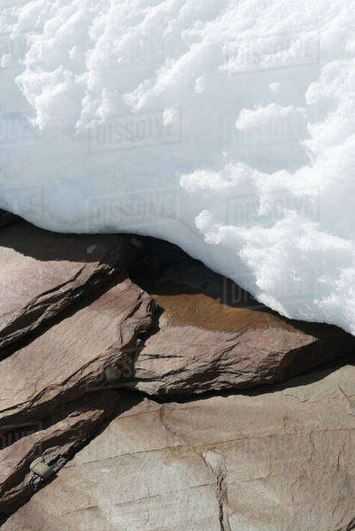 Snow on stones - Royalty-free Stock Photo | Dissolve