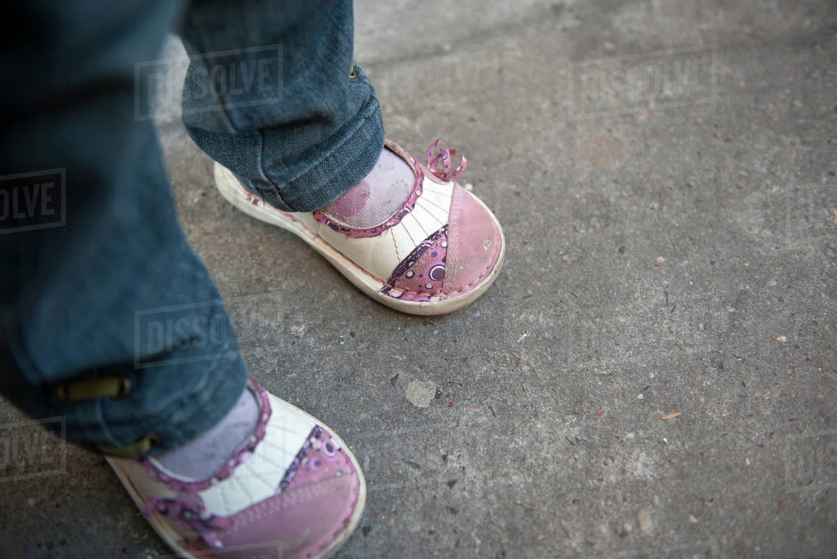 Little girl's legs and shoes - Royalty-free Stock Photo | Dissolve