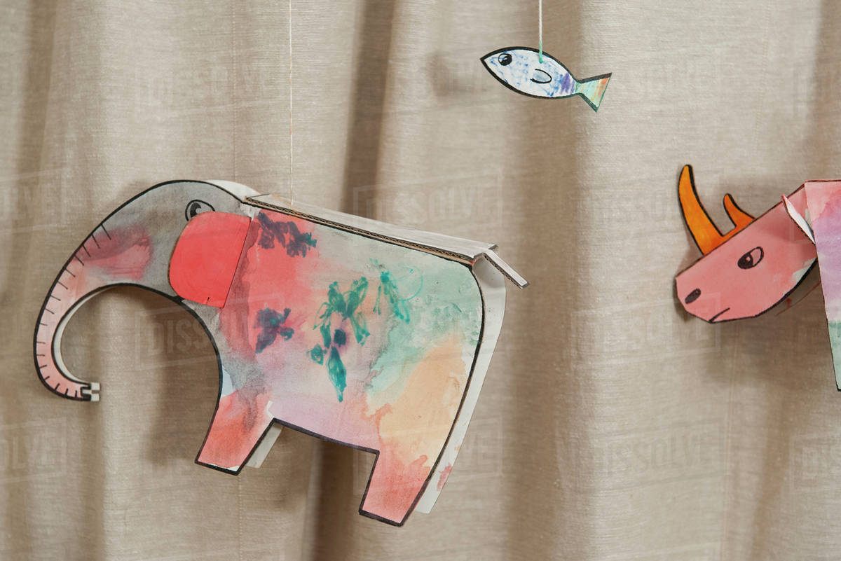 Child's animal drawings hanging on strings - Royalty-free Stock Photo ...