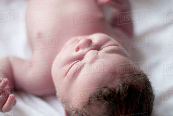 New born baby sleeping - Royalty-free Stock Photo | Dissolve