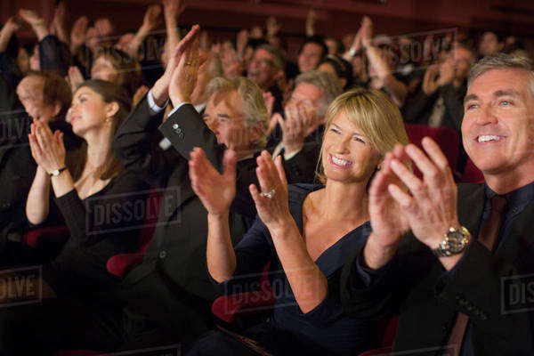 Enthusiastic audience clapping in theater - Royalty-free Stock Photo ...