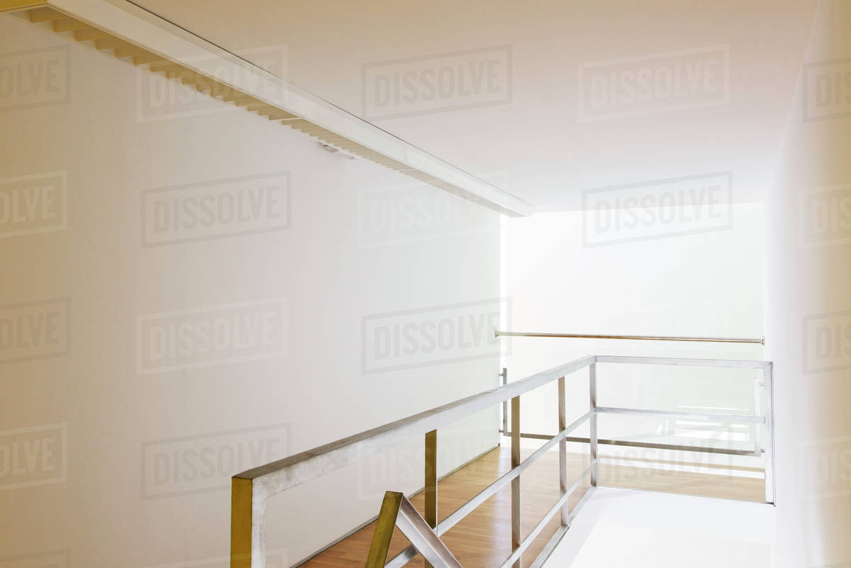 Railing and corridor in office - Royalty-free Stock Photo | Dissolve