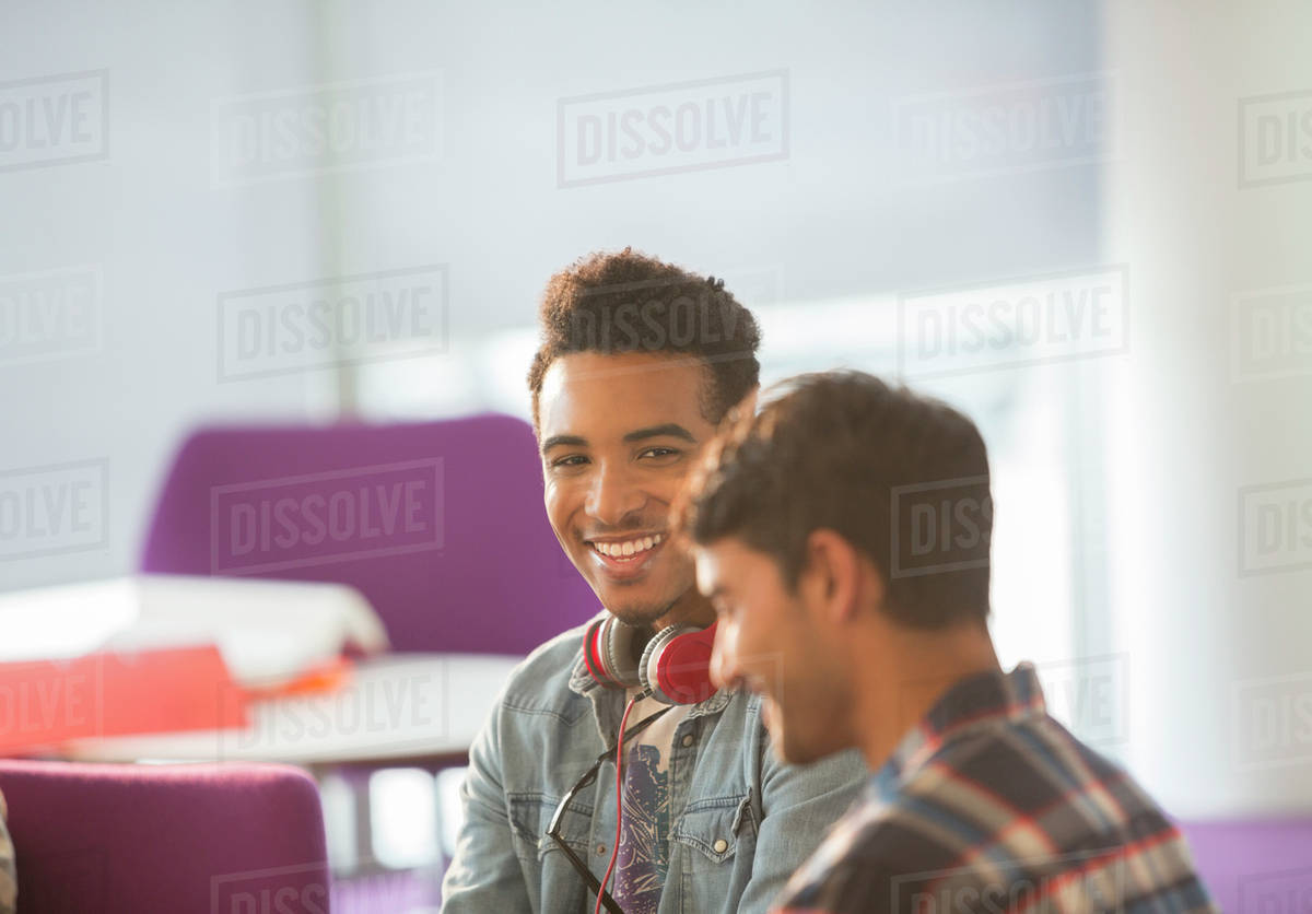 University students talking in lounge - Royalty-free Stock Photo | Dissolve