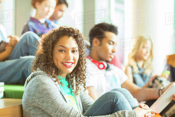 University student smiling in lounge - Royalty-free Stock Photo | Dissolve