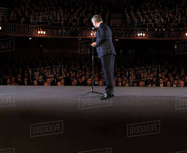 Performer on stage in theater - Royalty-free Stock Photo | Dissolve