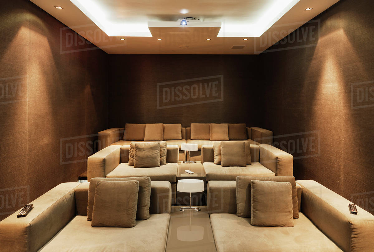 Movie screening room in modern house - Royalty-free Stock Photo | Dissolve