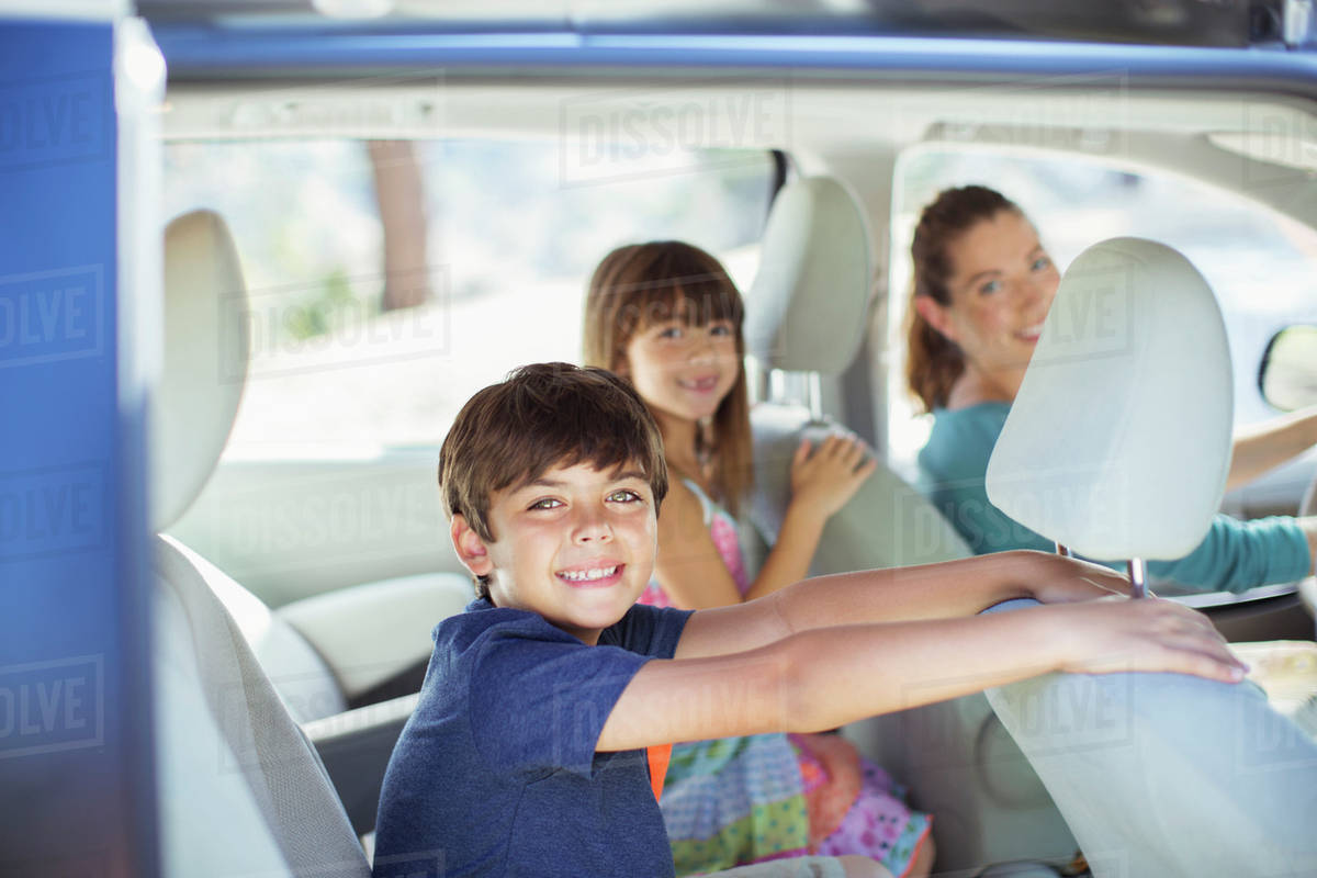 Portrait of happy family inside of car - Royalty-free Stock Photo ...