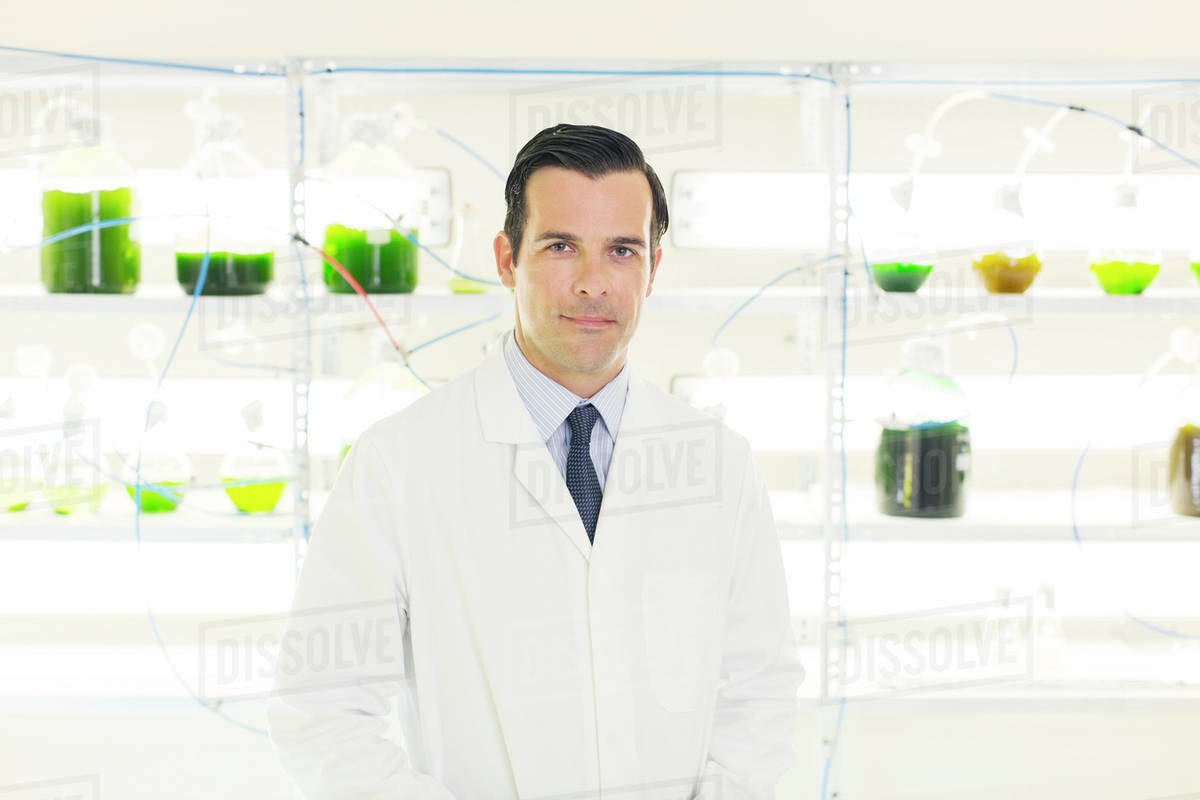 Portrait of confident scientist in laboratory - Stock Photo - Dissolve