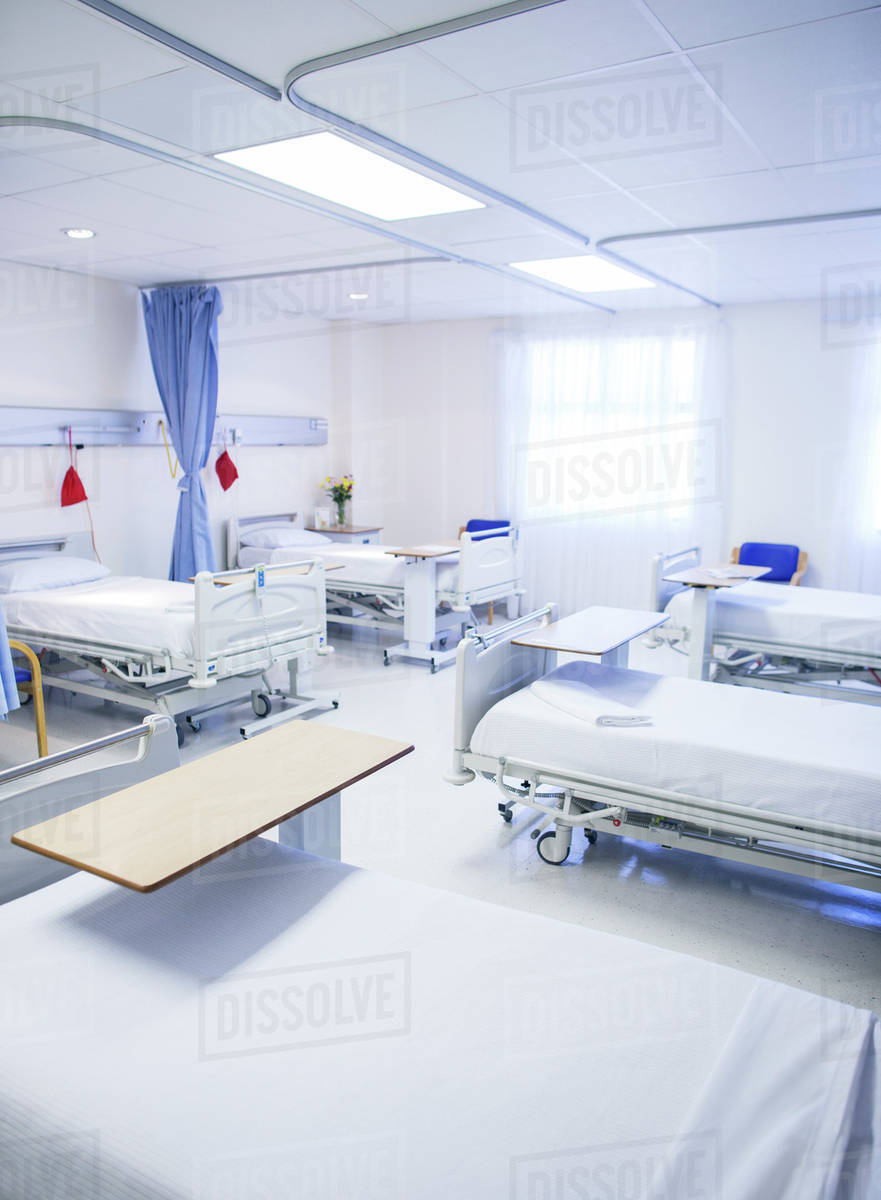 Empty beds in hospital room - Royalty-free Stock Photo | Dissolve
