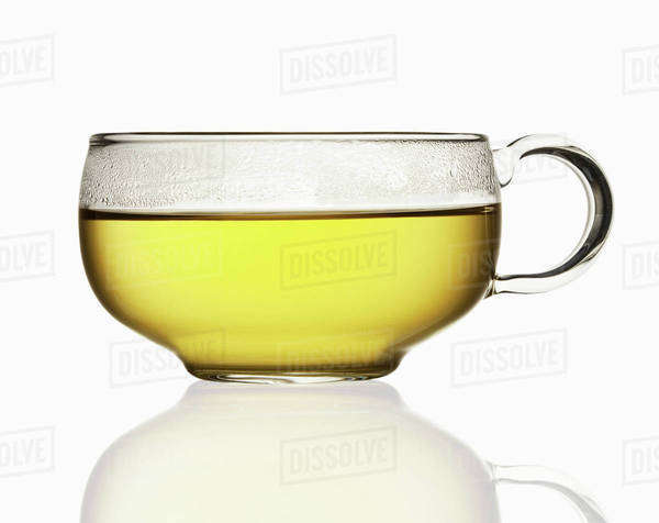 Close up of tea in transparent teacup - Royalty-free Stock Photo | Dissolve