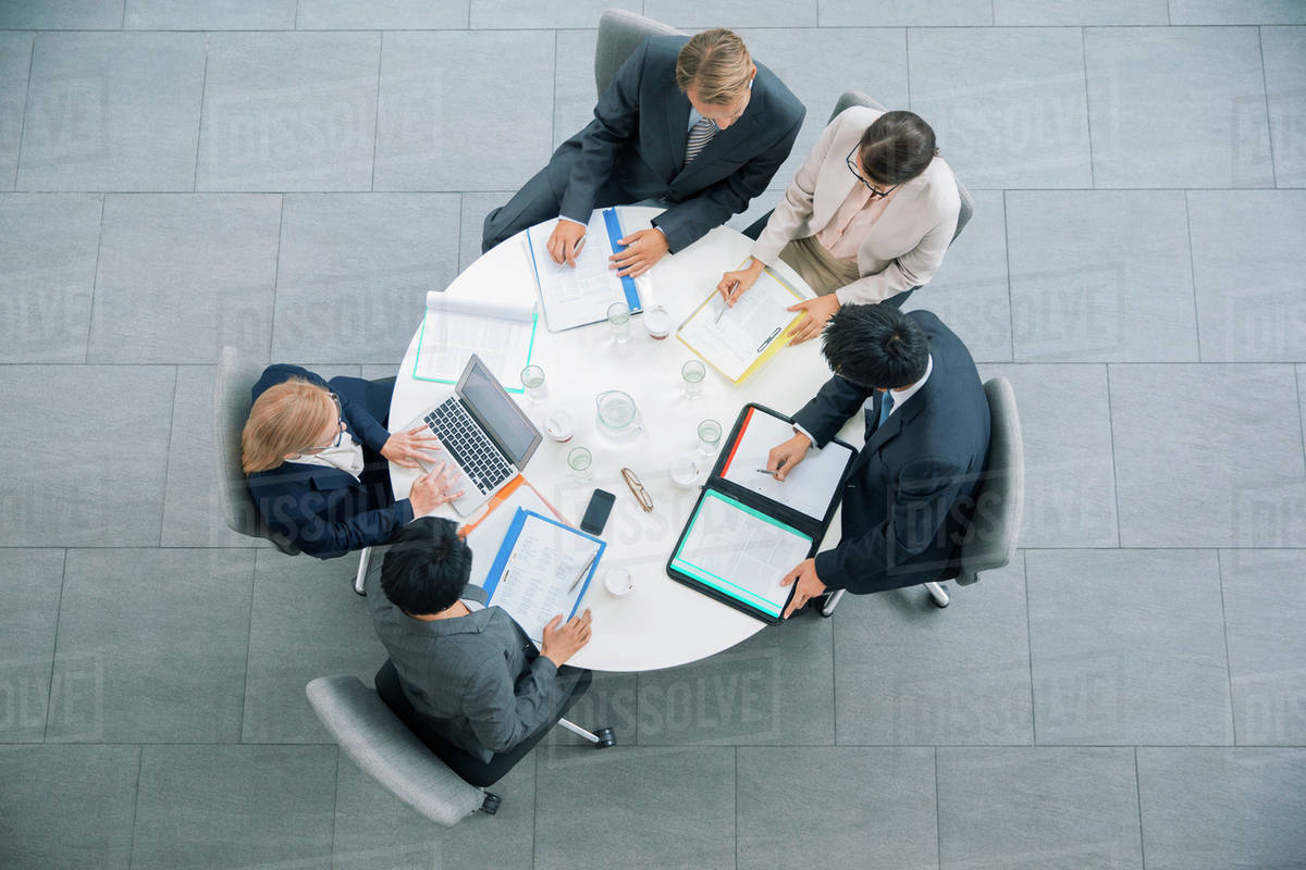 Business people having meeting at table - Royalty-free Stock Photo ...