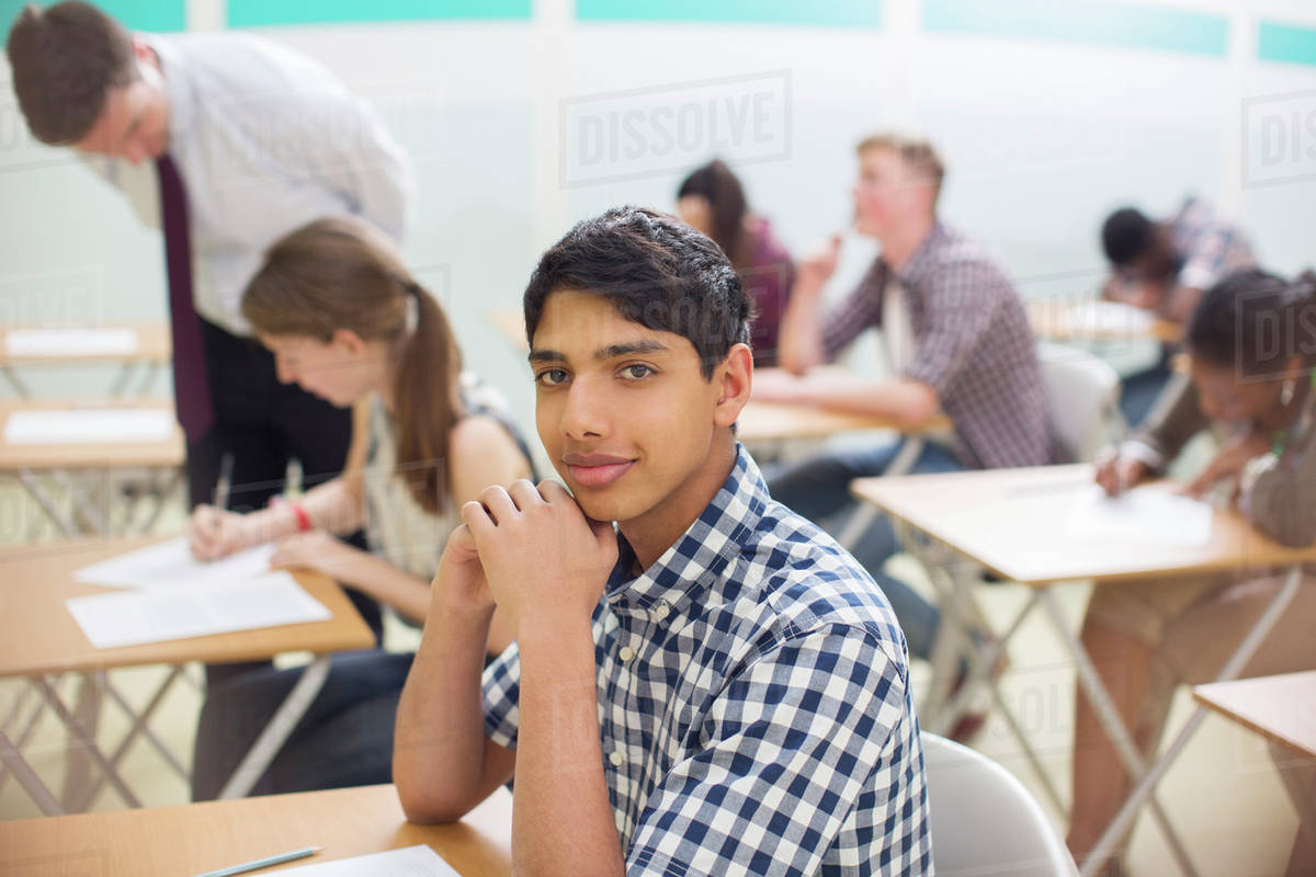 Portrait of confident student during his GCSE examination - Royalty ...