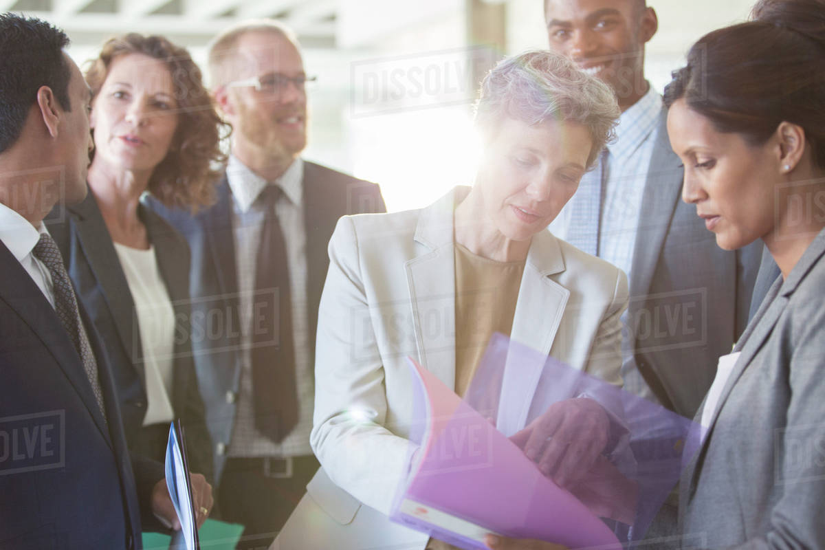 Office team sharing documents at meeting - Royalty-free Stock Photo ...