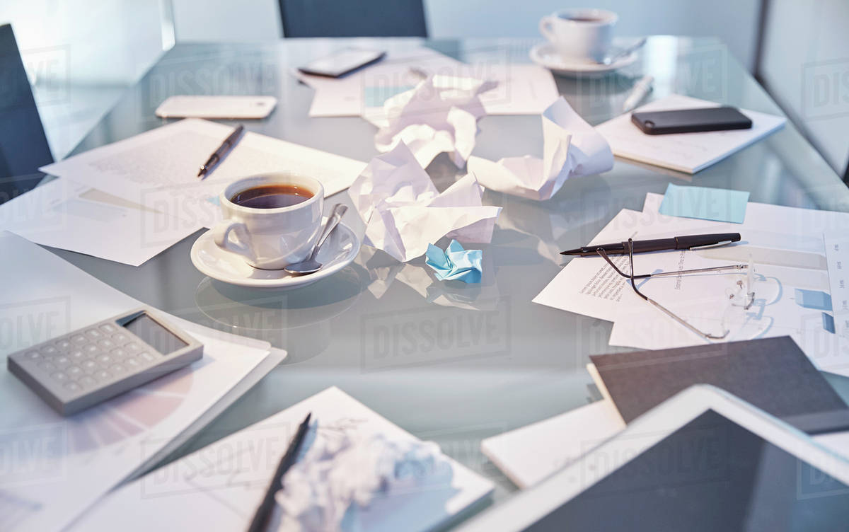 Messy table in conference room of modern office - Royalty-free Stock ...