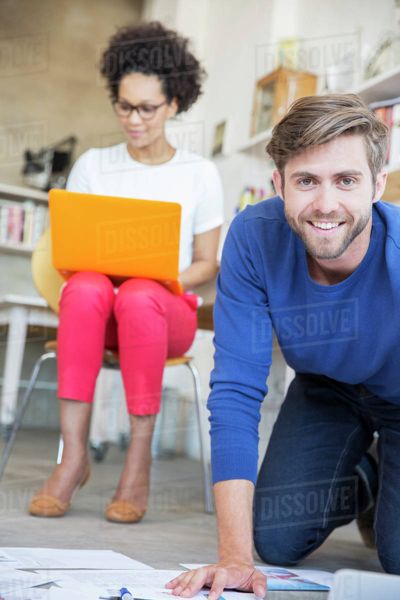 Two young people working together in studio - Royalty-free Stock Photo ...