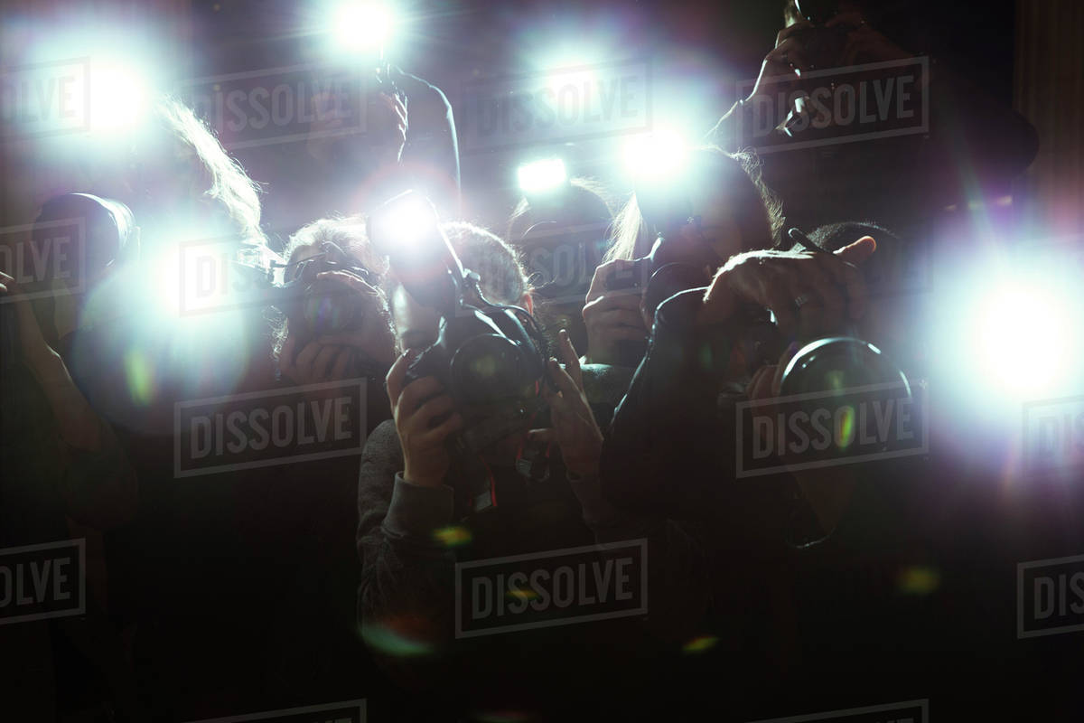 Close up of paparazzi photographers pointing cameras - Royalty-free ...