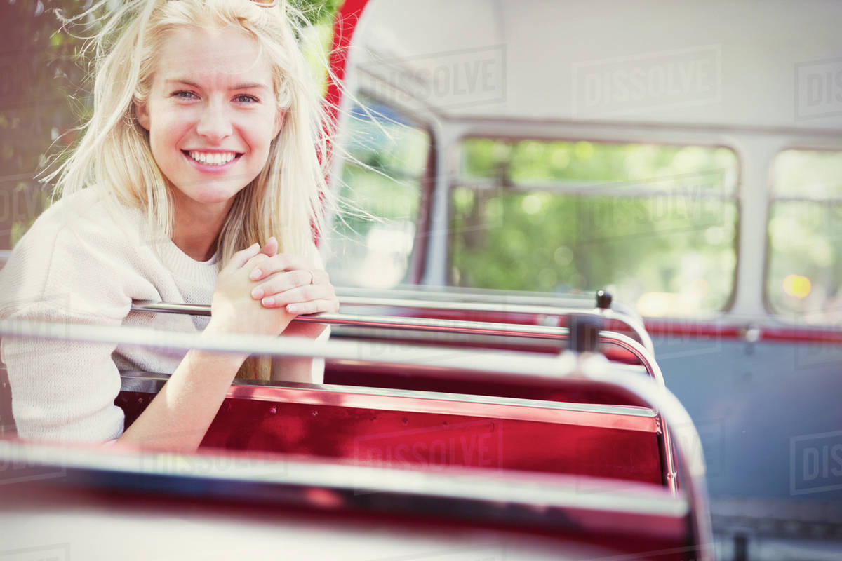 Portrait smiling woman riding double-decker bus - Royalty-free Stock ...
