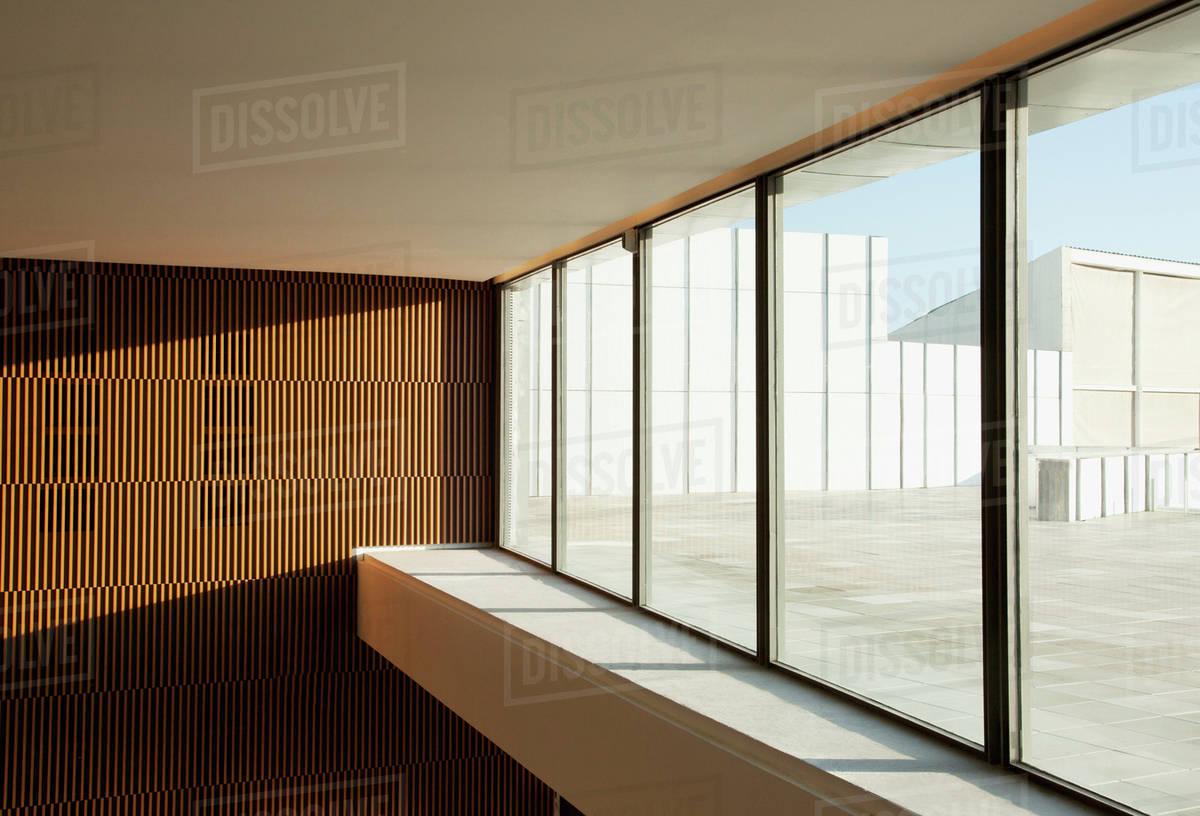 Sun shining in office window - Stock Photo - Dissolve